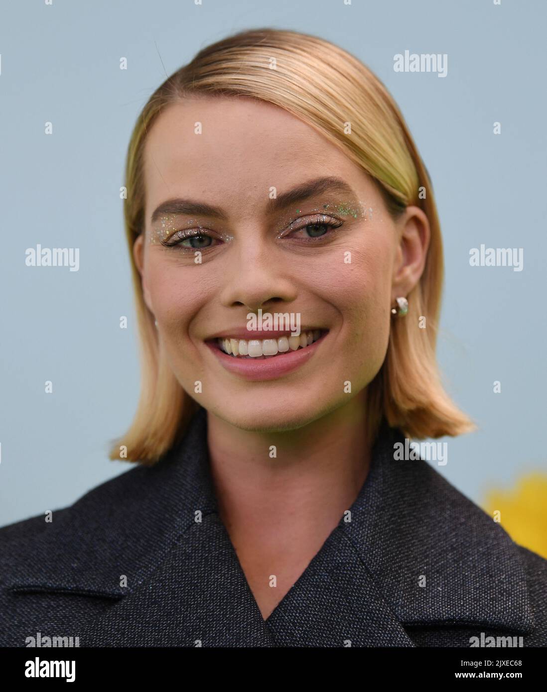 Actress Margot Robbie smiles as she arrives at the Australian premiere ...