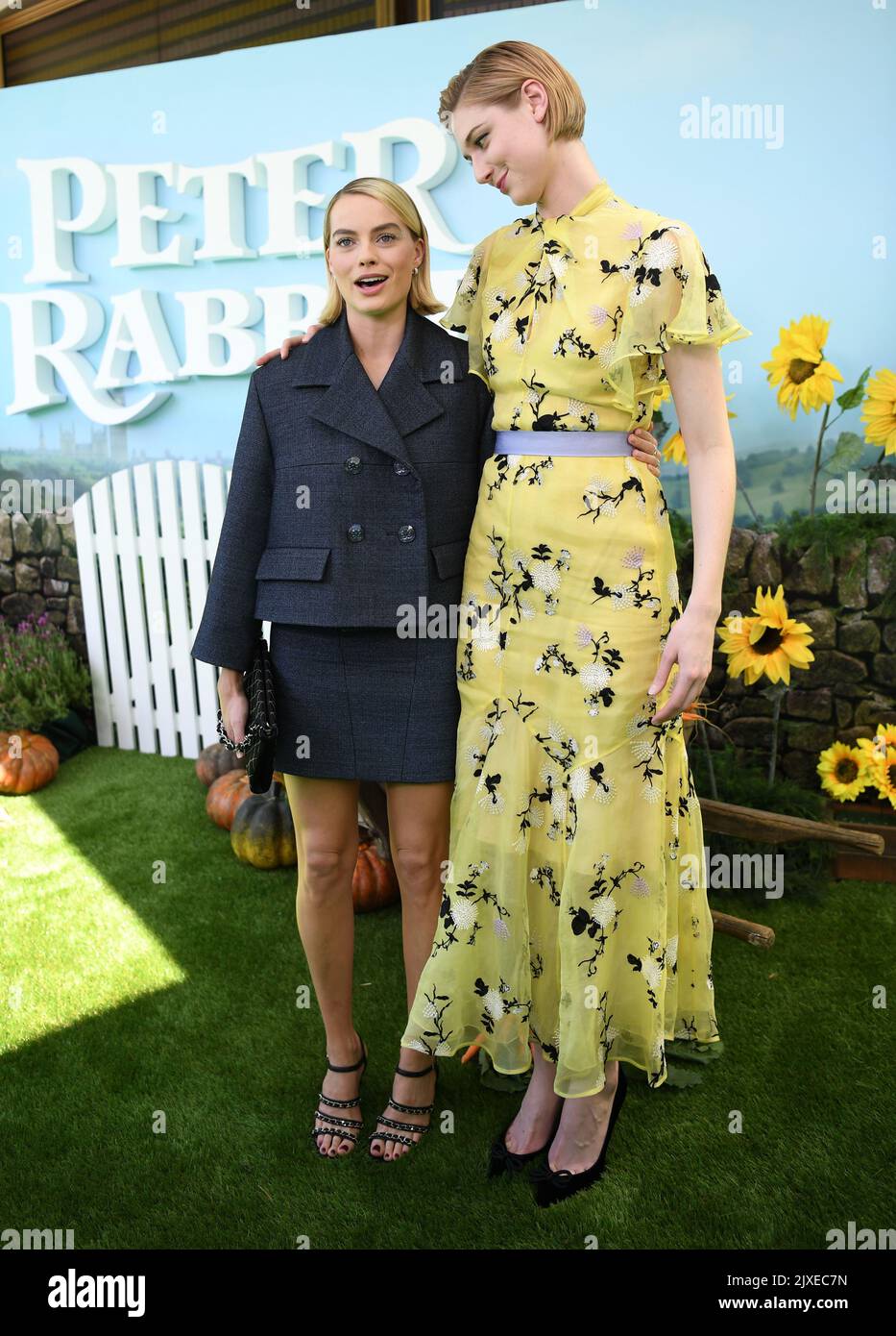 Margot Robbie (left) and Elizabeth Debicki pose for photographers as ...