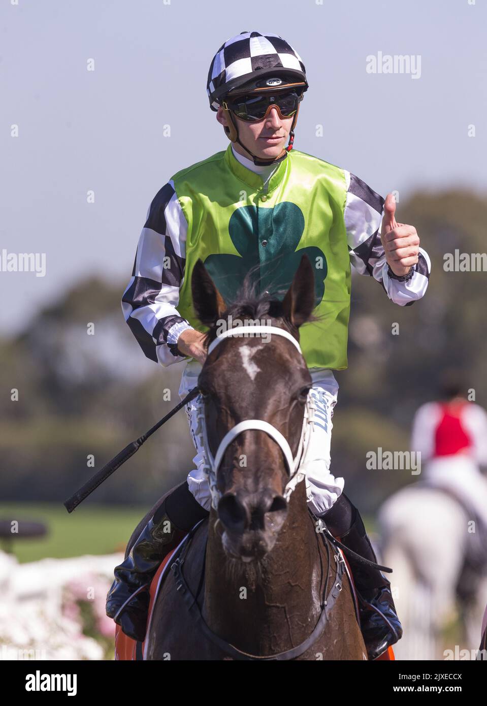 Jason Collett returns to scale after riding Unforgotten to win race 6 ...