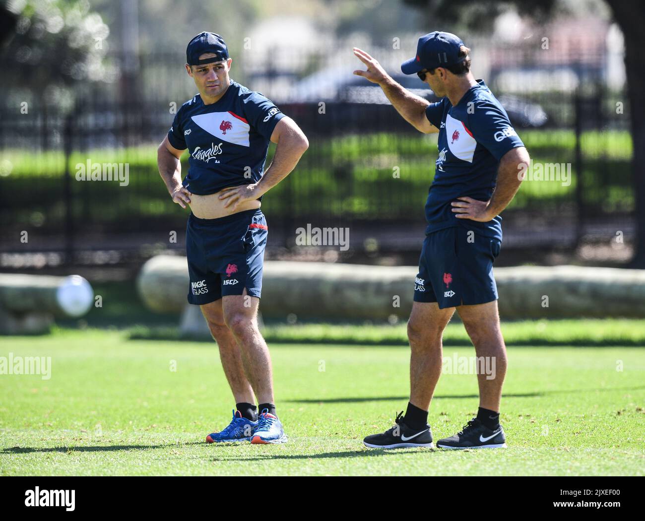 Cooper Cronk (left) of the Sydney Roosters is seen with Andrew Johns ...