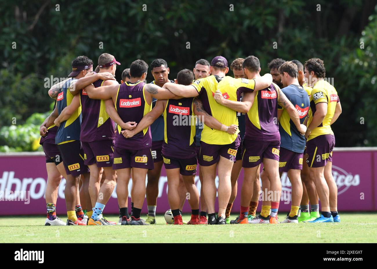 Broncos players are seen in a team huddle during Brisbane Broncos ...