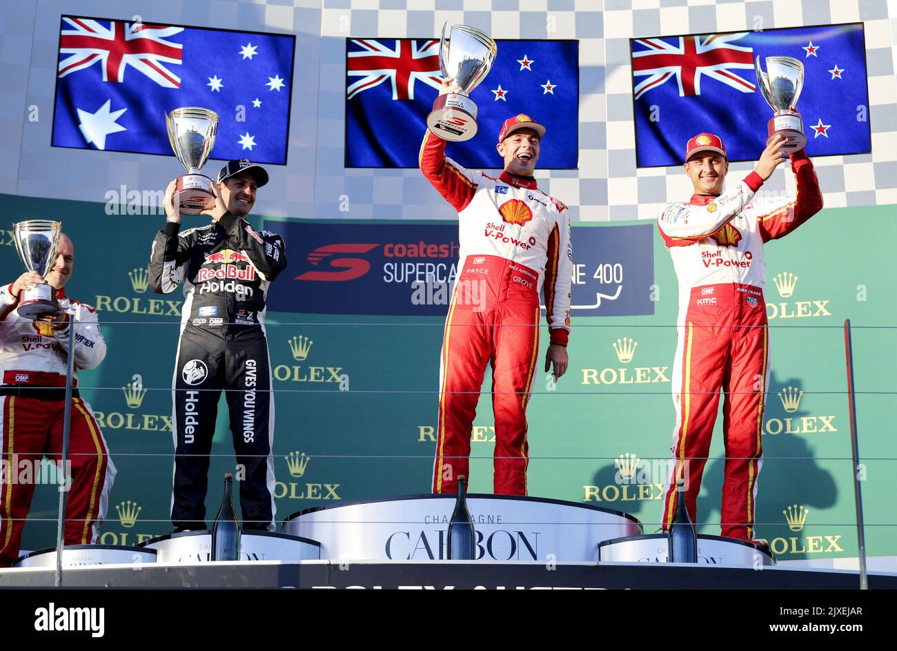 Shell V-Power Racing Team Scott McLaughlin (centre) on the podium with ...