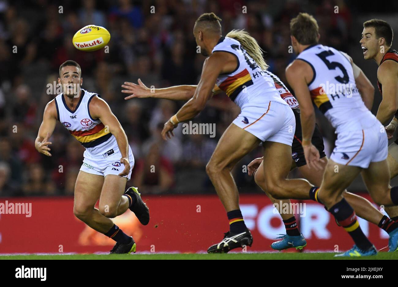 Lachlan Murphy of the Crows (left) is seen in action during the Round 1 ...