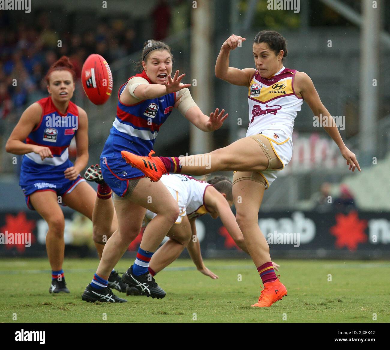Ally Anderson of the Lions kicks forward during the AFLW grand final ...