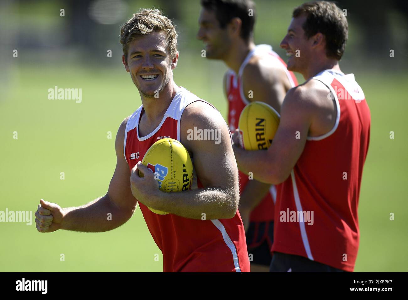 Sydney Swans player Luke Parker (left) takes part in a light training ...