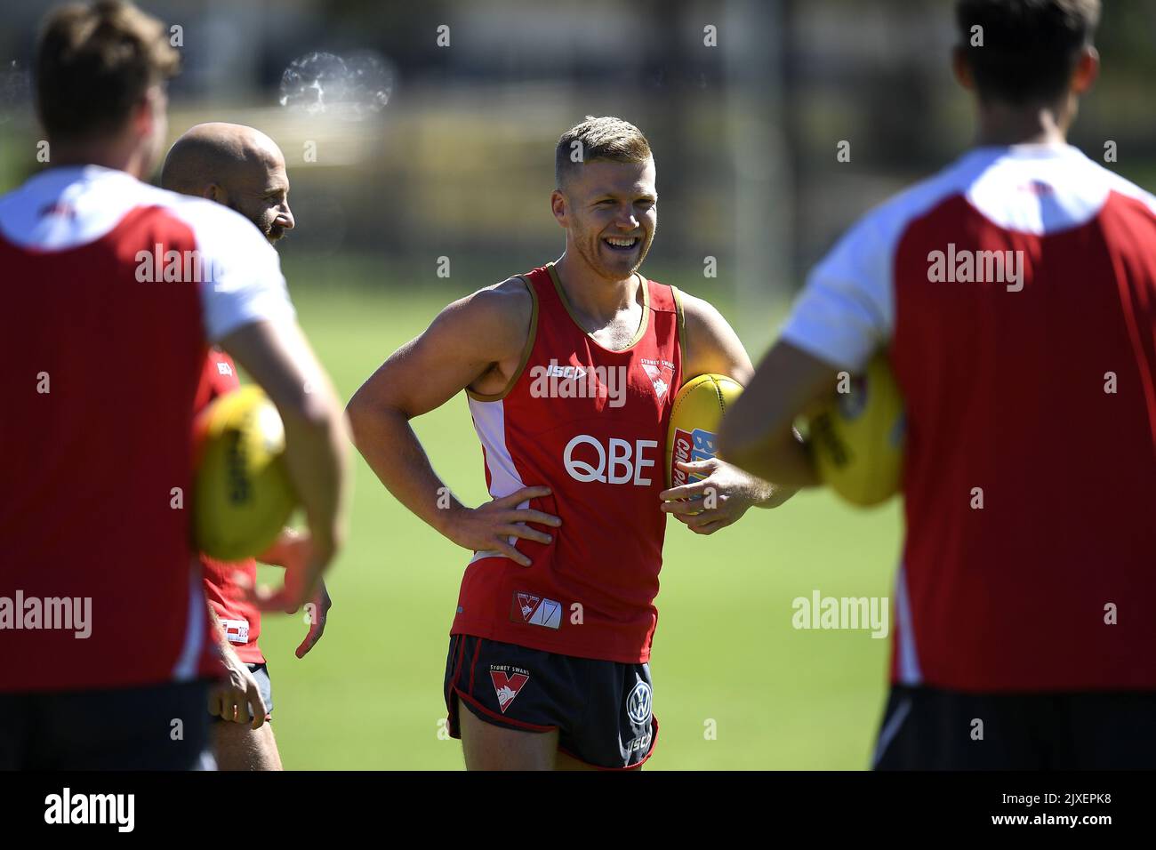 Sydney Swans player Dan Hannebery (centre) takes part in a light ...