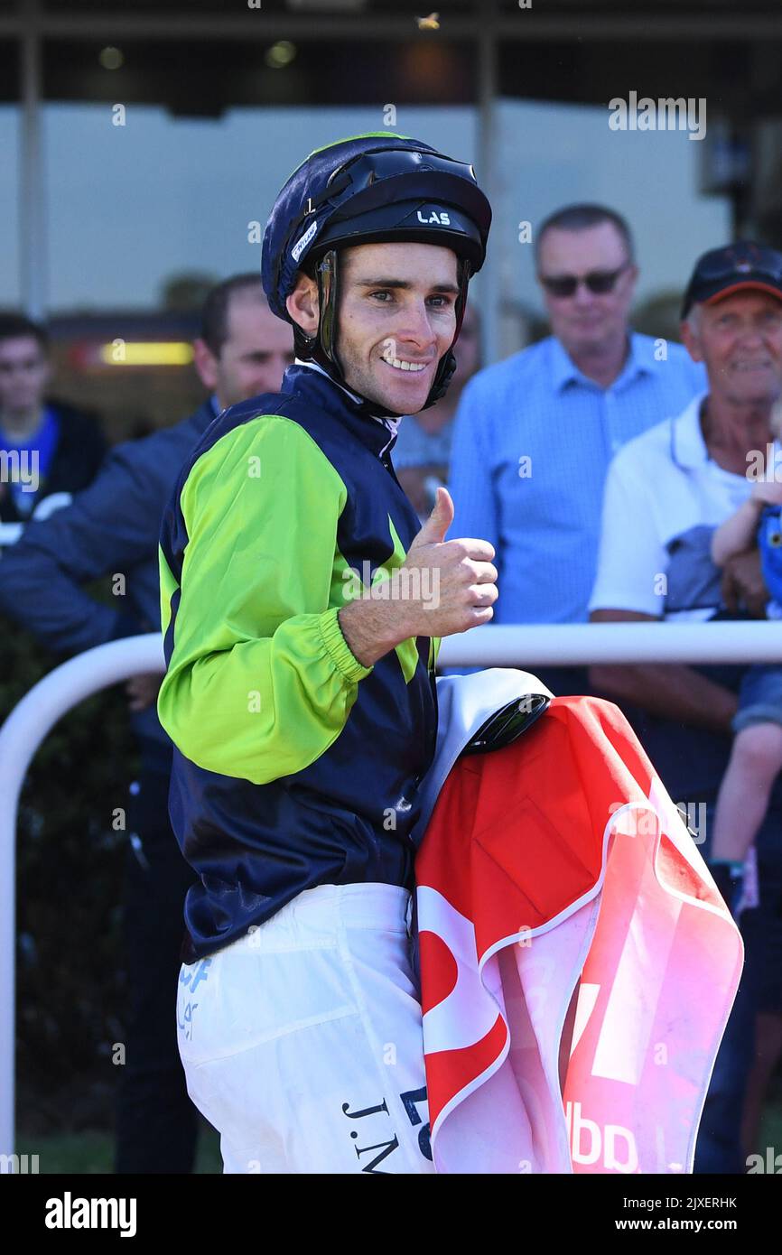 Jockey Jamie Mott riding Ray's Dream returns to scale after winning ...