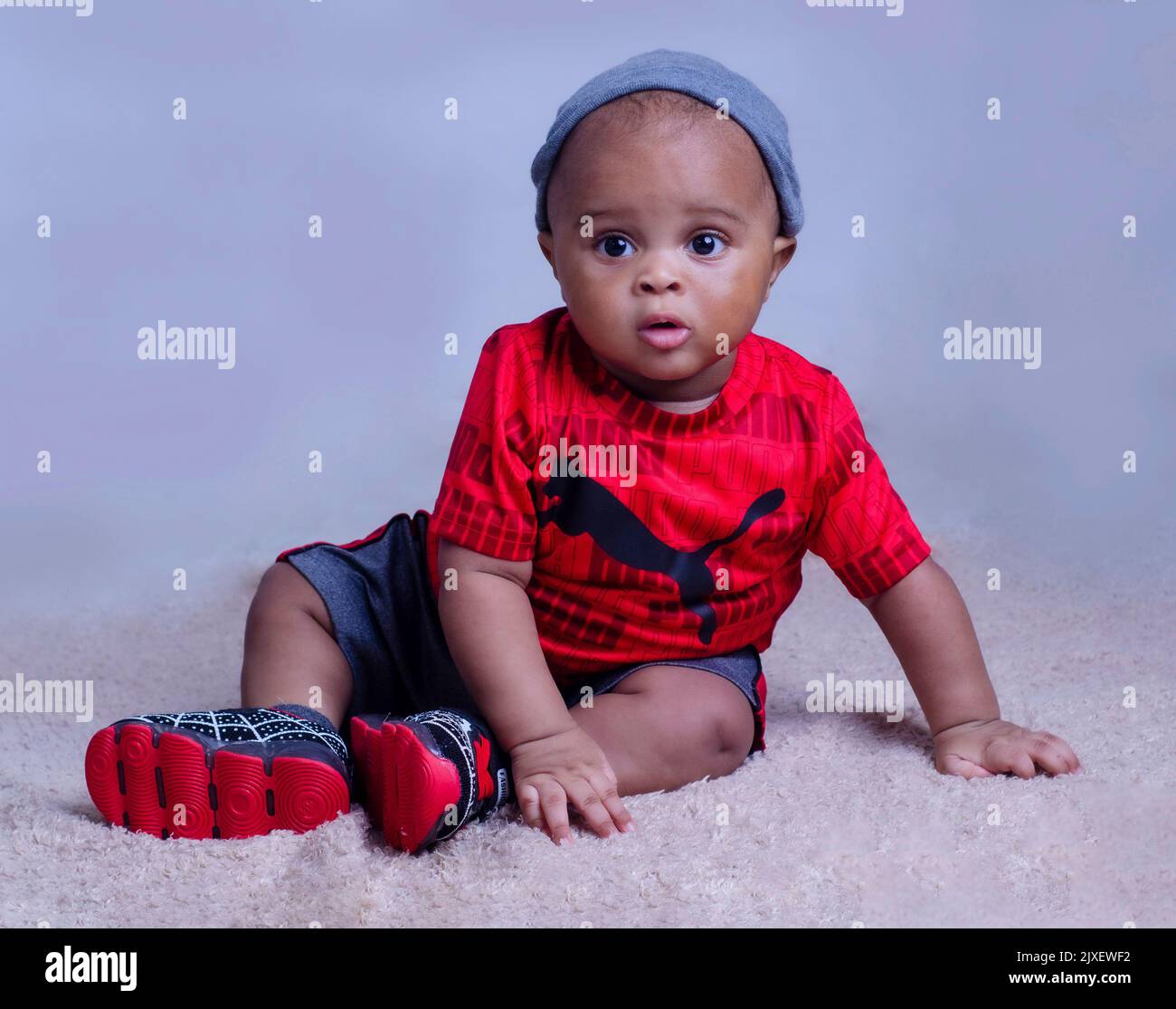 Boy crawling african floor hi-res stock photography and images - Alamy