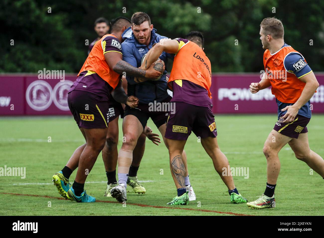 Josh McGuire (centre) in action during a Brisbane Broncos training ...