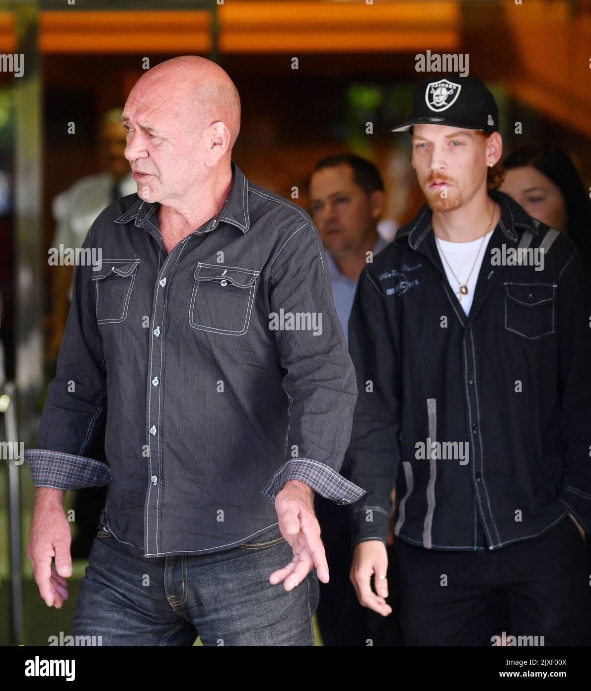 Family members of victims are seen outside the Adelaide Supreme Court ...