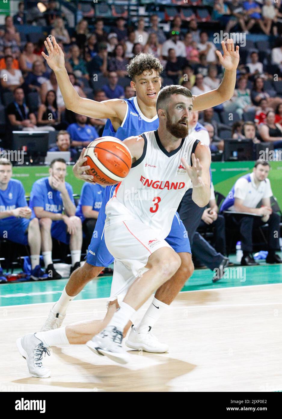 Adam Thoseby of England makes his way around Sean Nealon-Lino of ...