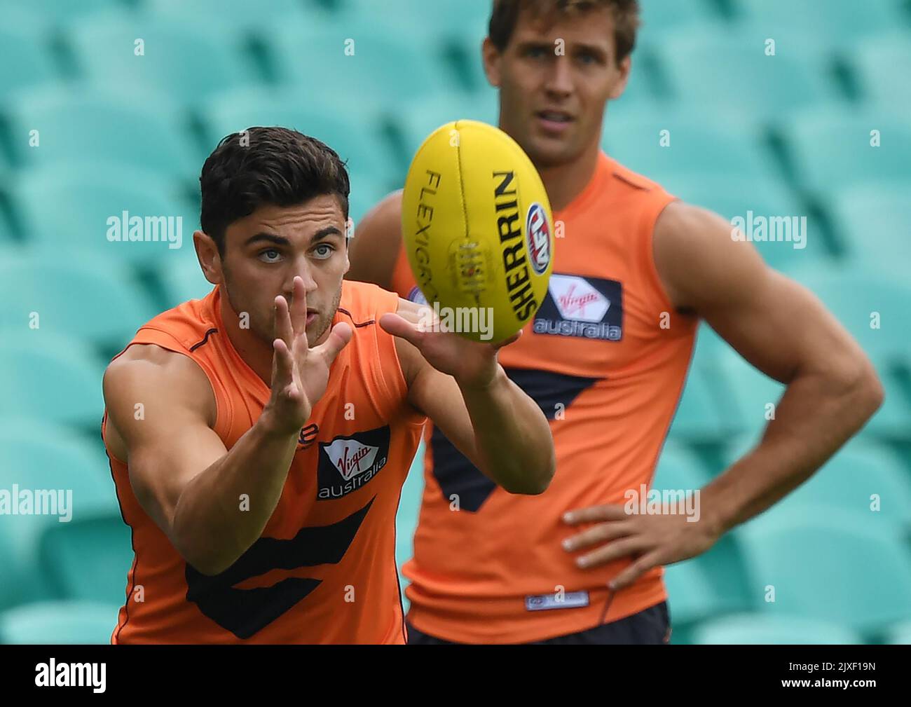 Tim Taranto of the GWS Giants catches a ball during a team training ...