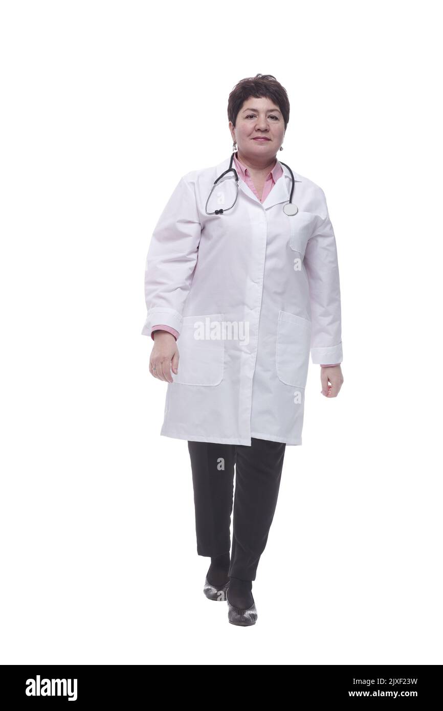 in full growth. female medic striding forward . isolated on a white ...