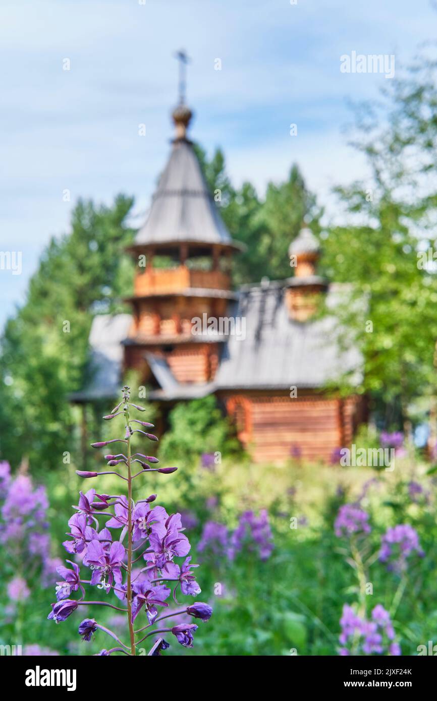 Modern log hipped-roof church in style of Russian wooden architecture ...