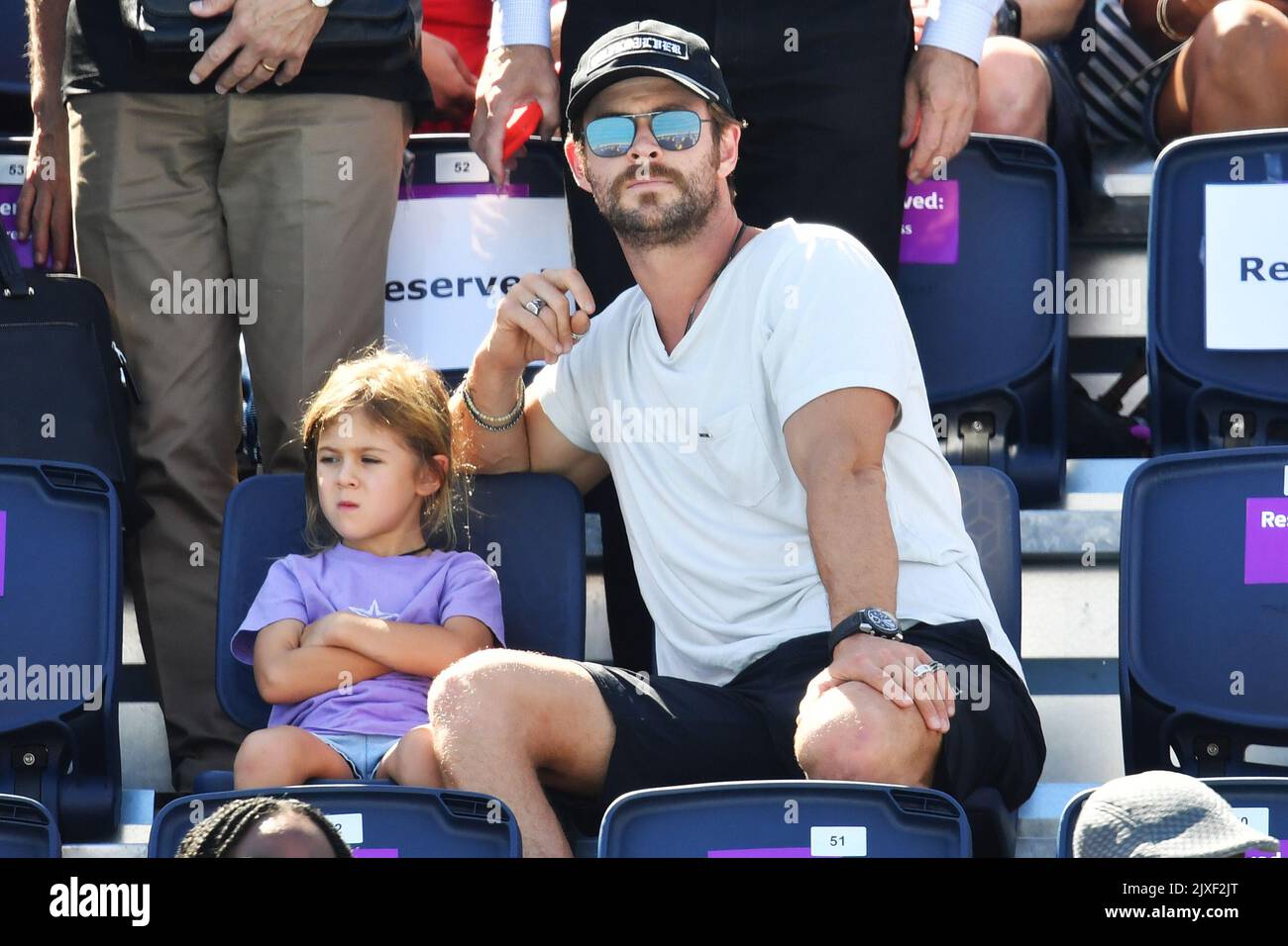 Actor Chris Hemsworth and his daughter watches the swimming heats on ...