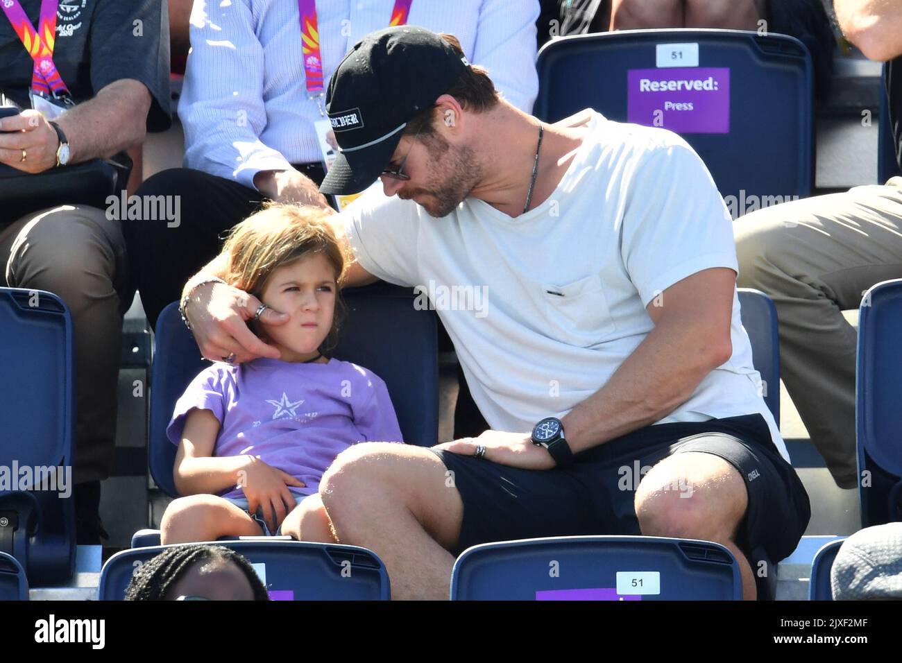 Actor Chris Hemsworth and his daughter India Rose watch the swimming ...