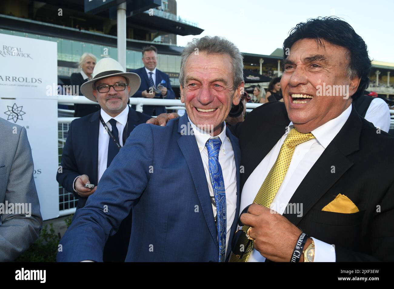 Race horse trainer Gerald Ryan (left) smiles after Trapeze Artist wins ...