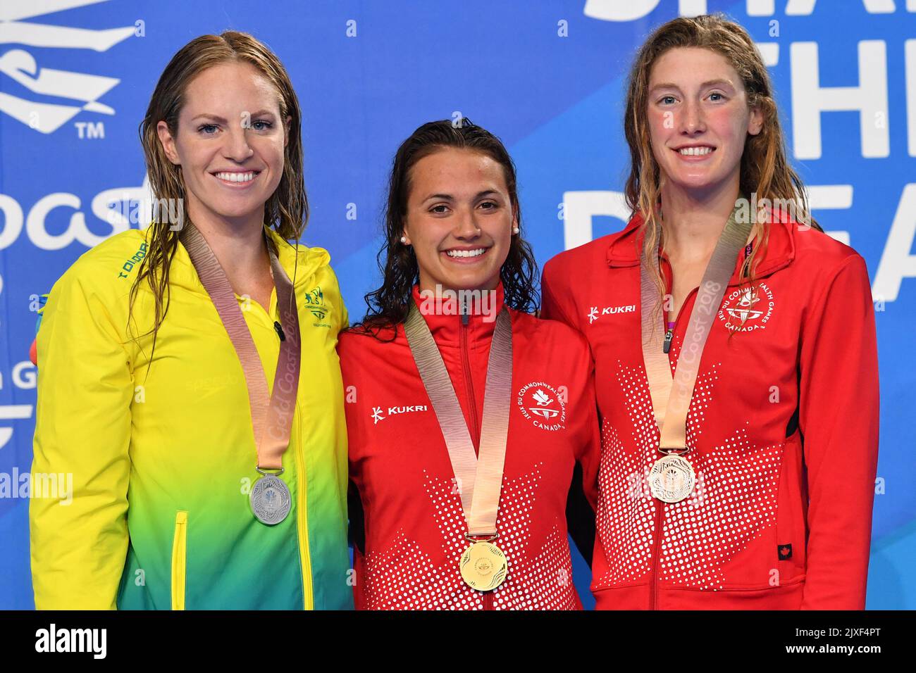 (L-R) Silver medalist Emily Seebohm of Australia, gold medalist Kylie ...