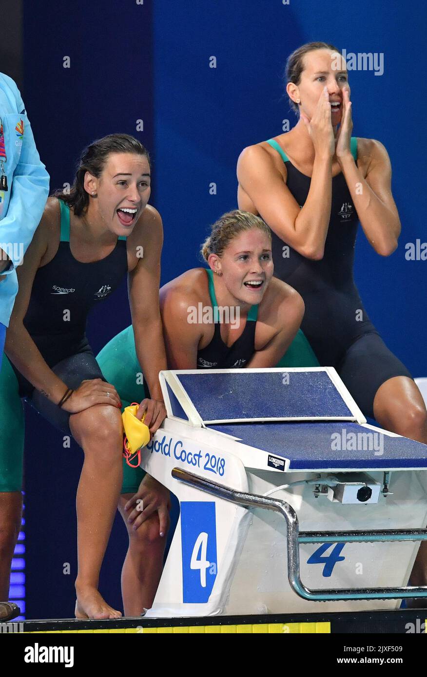 (L-R) Brianna Throssell, Leah Neale and Emma McKeon of Australia cheer on team mate Ariarne ...
