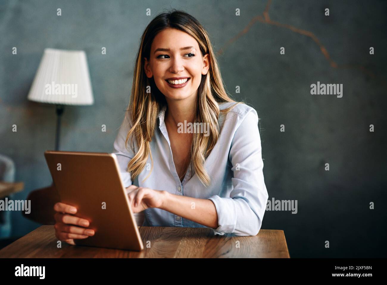 Portrait of happy beautiful successful business woman, manager working ...
