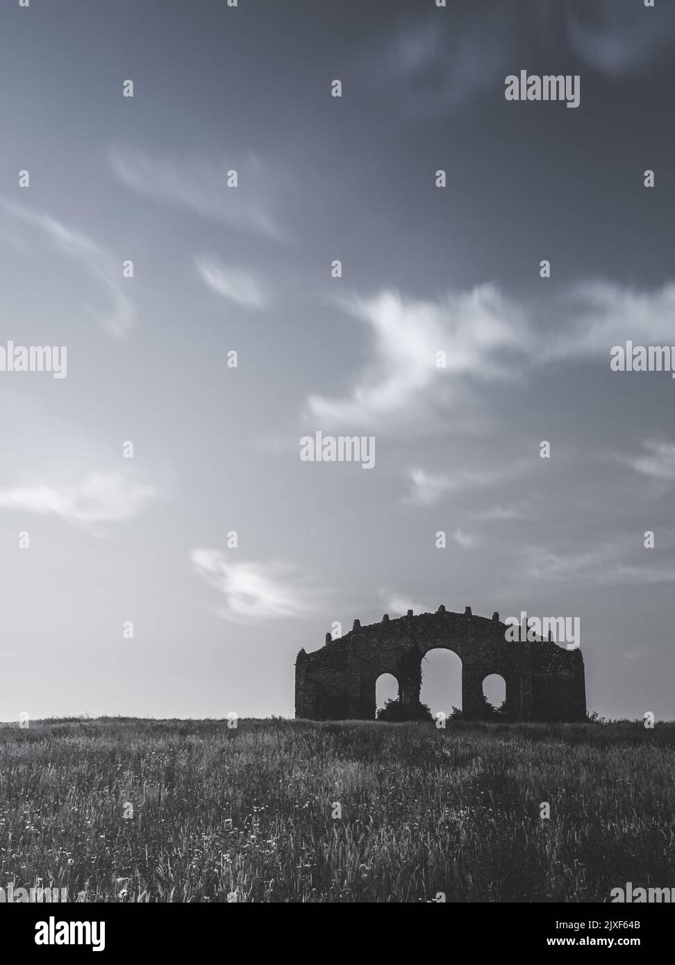 The Rouseham Eyecatcher folly ( faux ruin ) in the middle of a field in ...