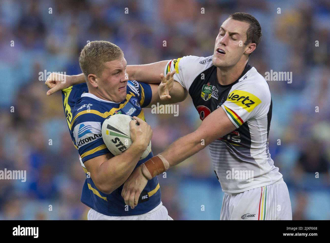 Isaah Yeo of the Panthers tackles Daniel Alvaro of the Eels during the ...