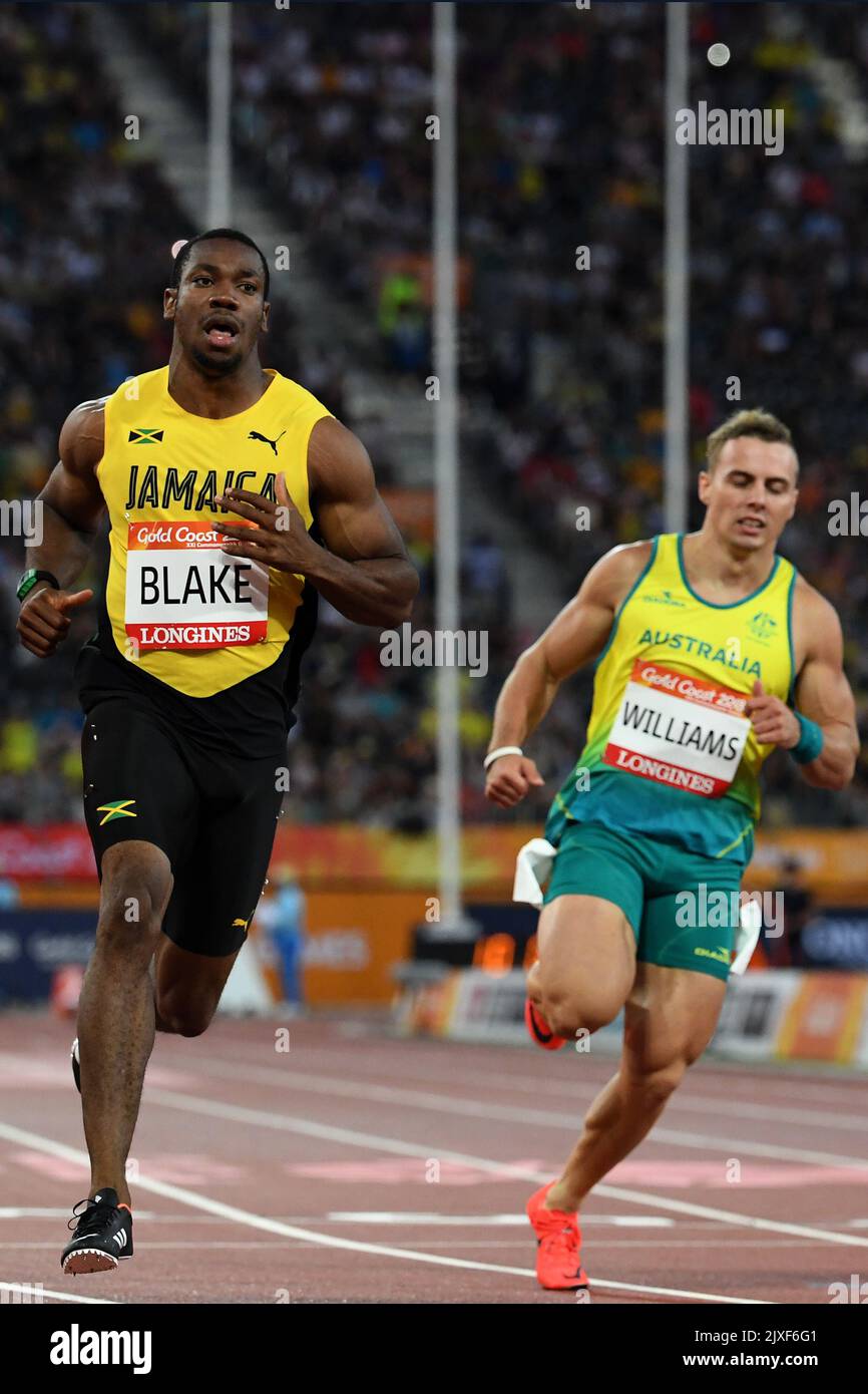 Yohan Blake of Jamaica (centre) wins the men's 100m semi-final 1 with ...