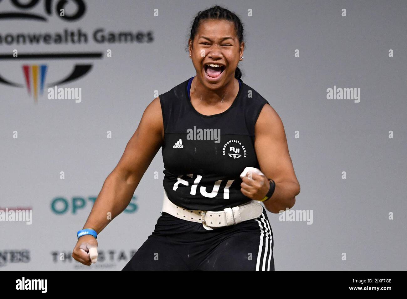 Eileen Cikamatana celebrates after a successful lift during the Women's ...