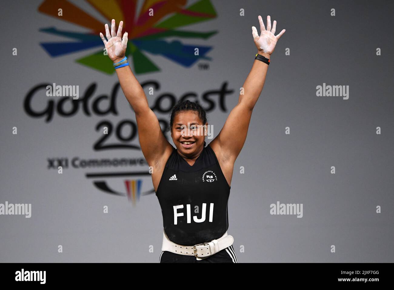 Eileen Cikamatana celebrates after a successful lift during the Women's ...