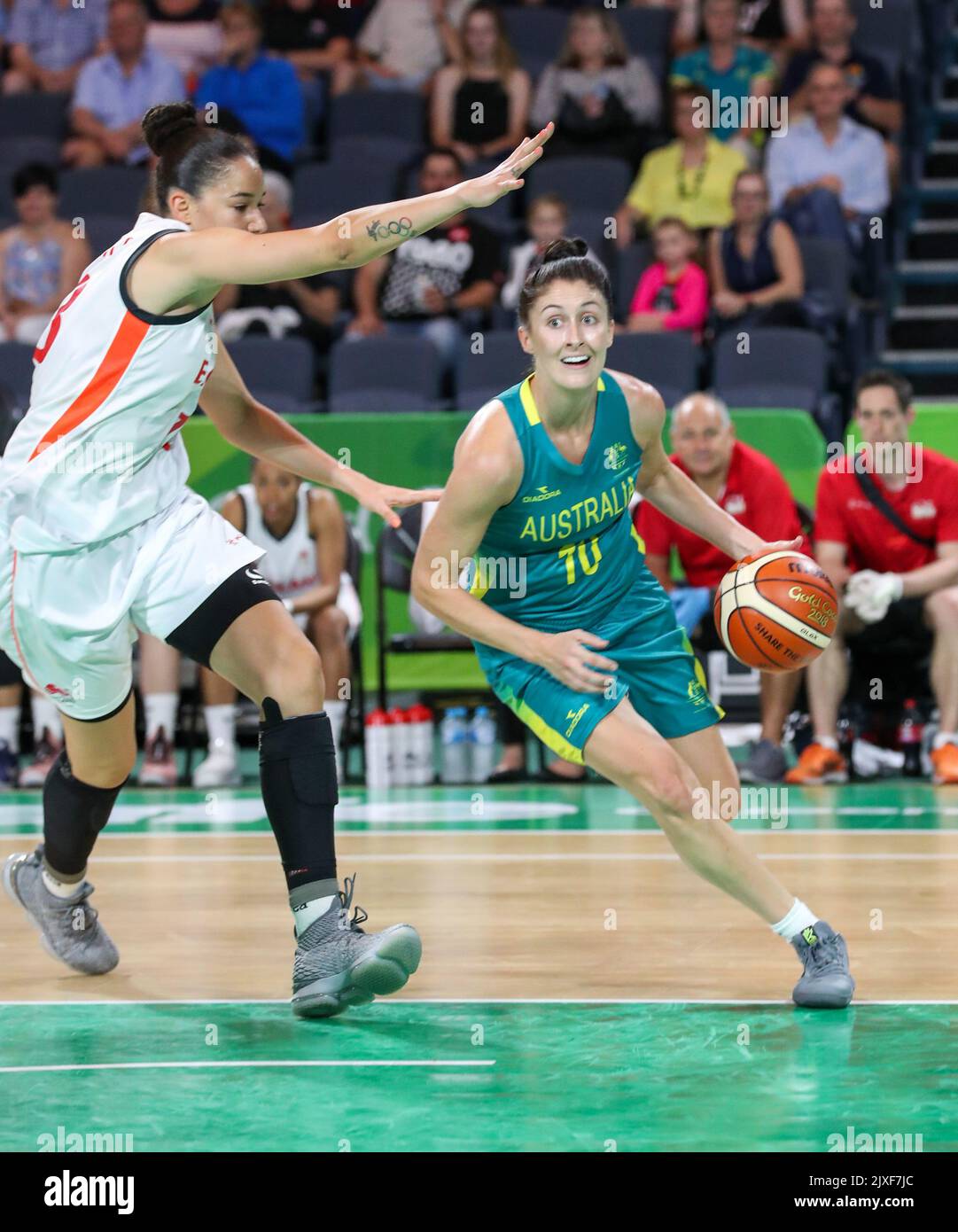 Katie Ebzery of Australia makes her way around Azania Stewart of ...