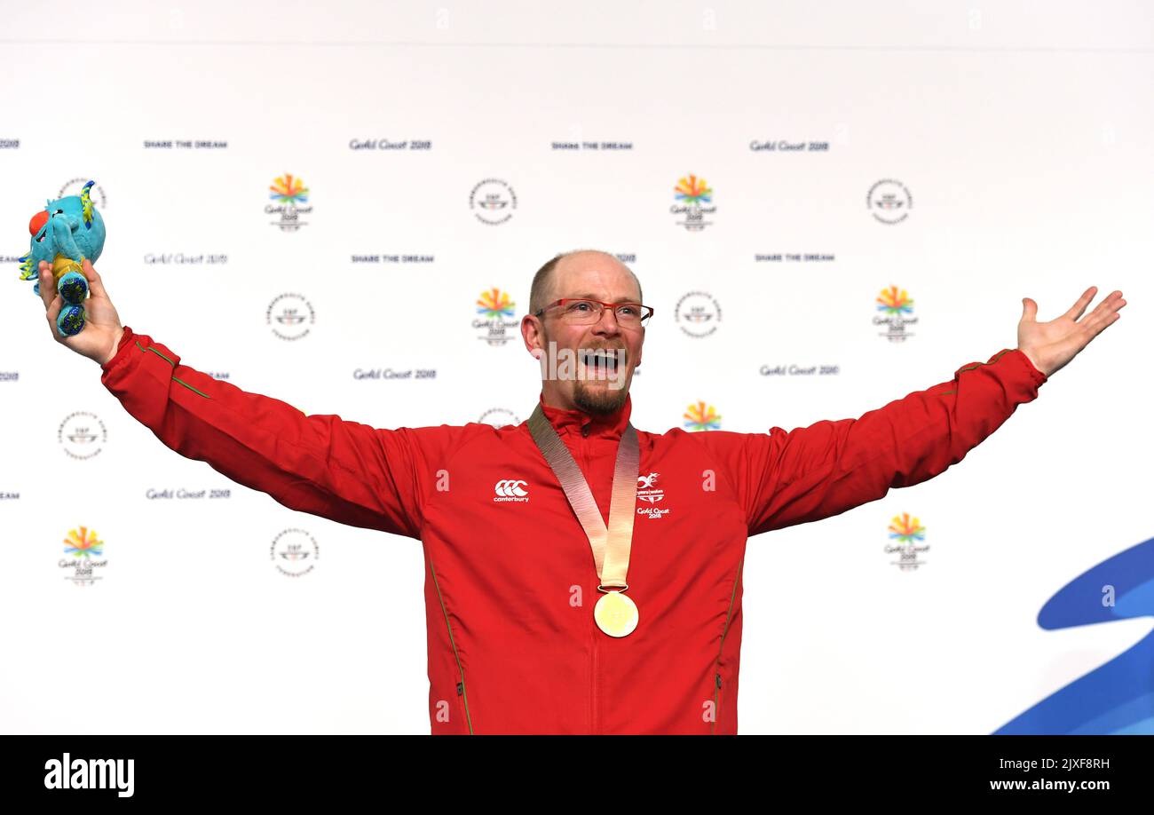 David Phelps of Wales celebrates taking the gold in the 50m Rifle Prone ...