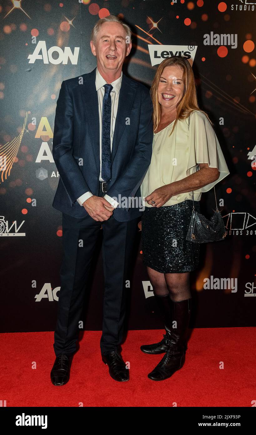 Singer Mark Callaghan and wife Margo walks the red carpet ahead of the ...