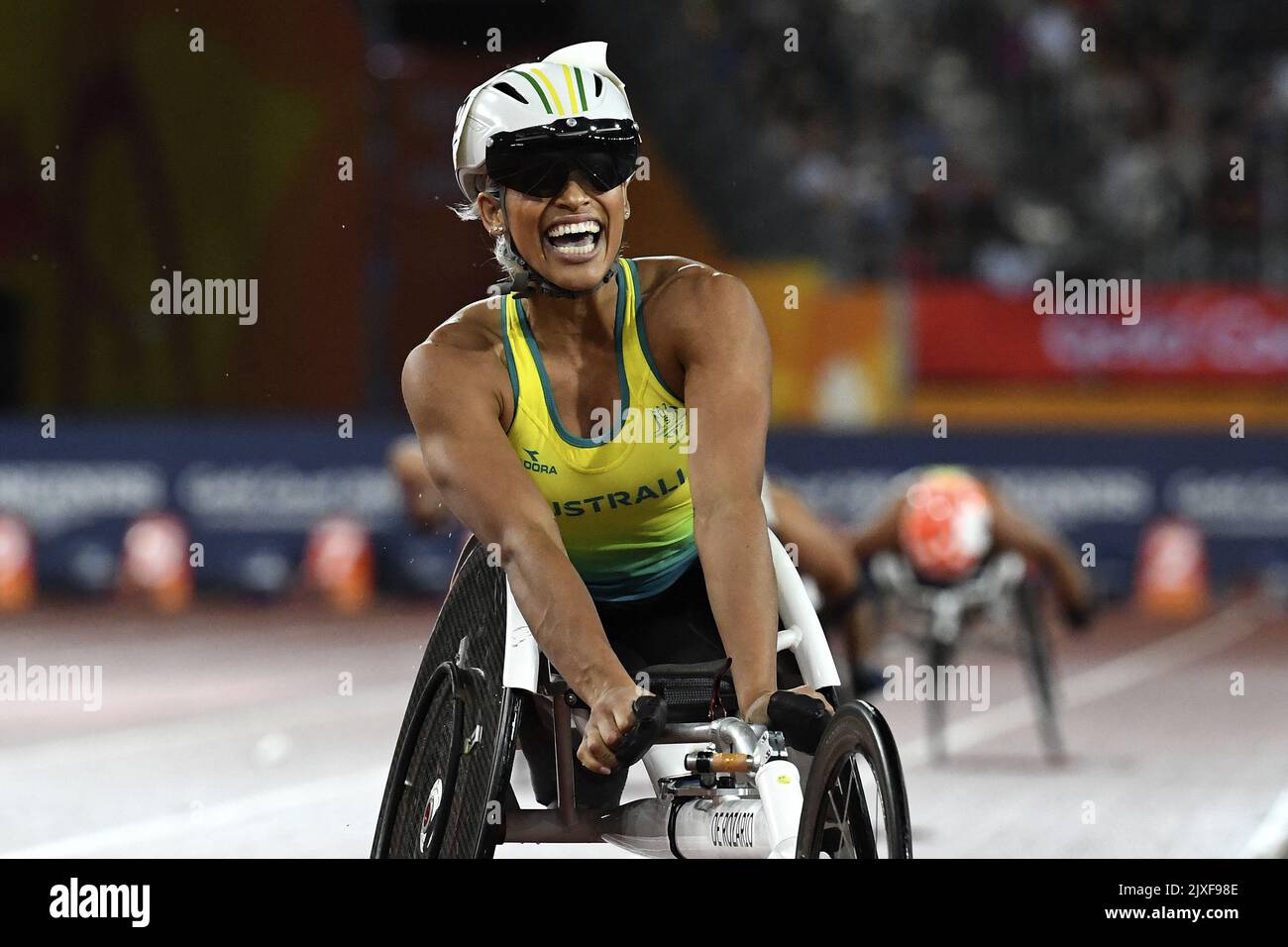 Madison de Rozario of Australia crosses the finish line to win the gold ...