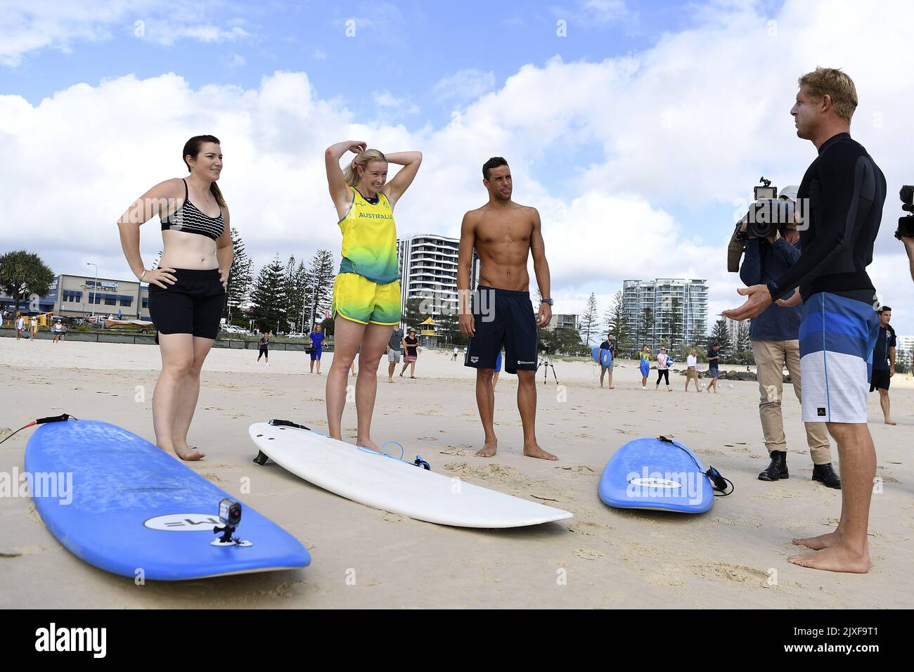 Australian surfer Mick Fanning (right) hosts a surf lesson for former ...