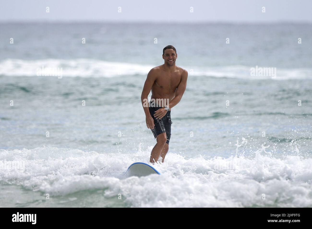 Australian surfer Mick Fanning hosts a surf lesson for former ...