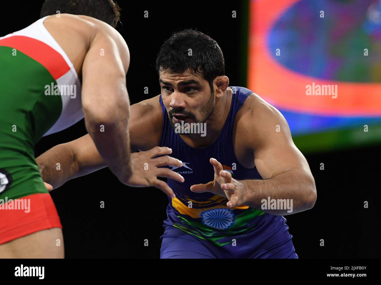 Kumar Sushil of India (right) is seen during his bout against Muhammad Asad Butt of Pakistan at ...