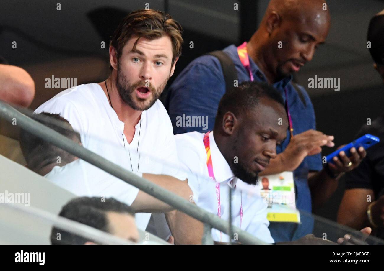 Actor Chris Hemsworth and Jamaican athlete Usain Bolt watch the ...
