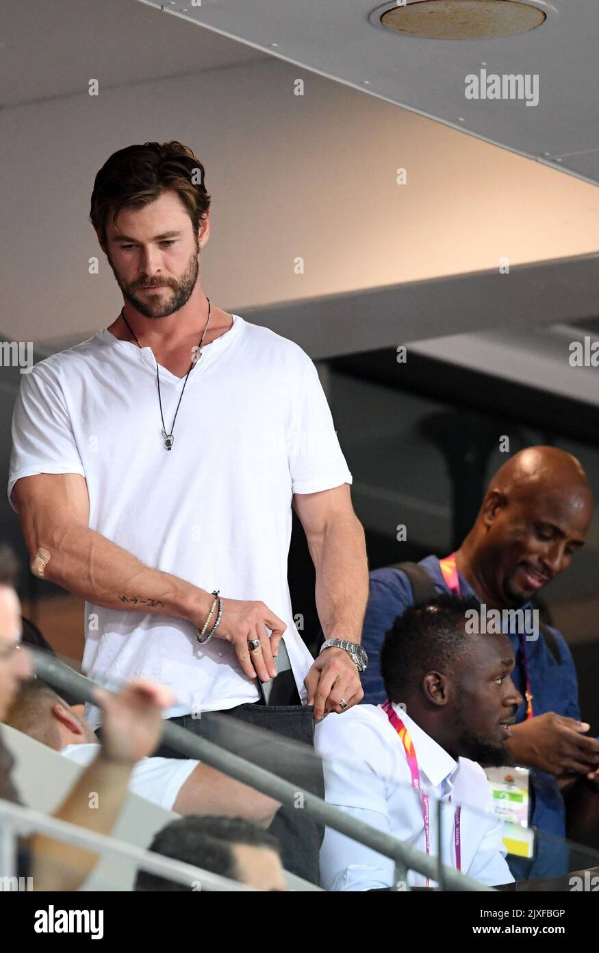 Actor Chris Hemsworth (left) and Jamaican athlete Usain Bolt (sitting ...