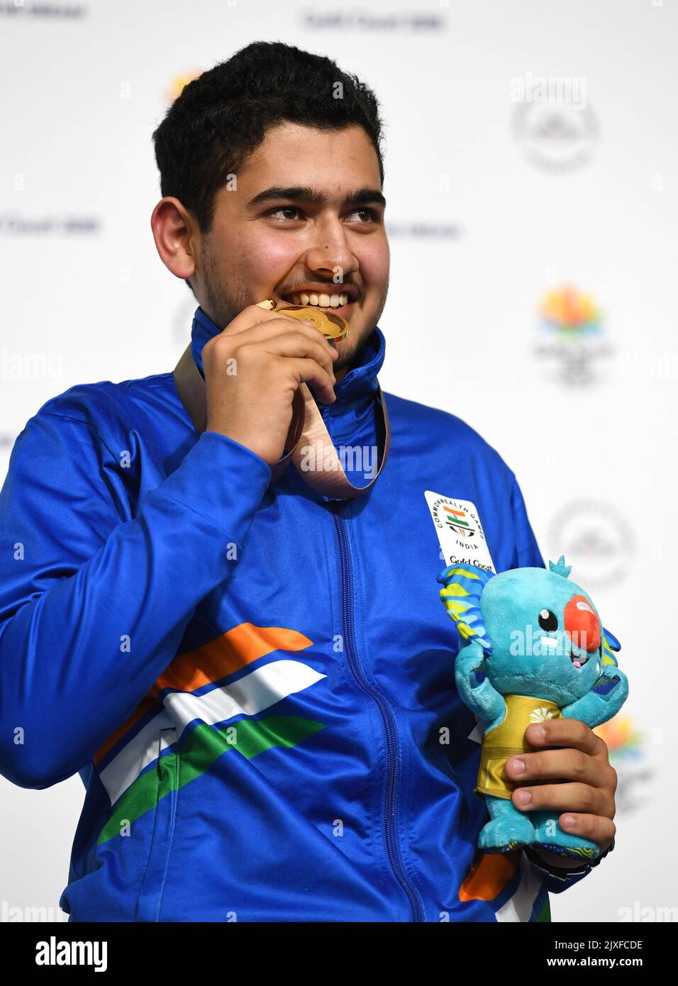 Anish of India celebrates gold in the 25m Rapid Fire Pistol Men's ...