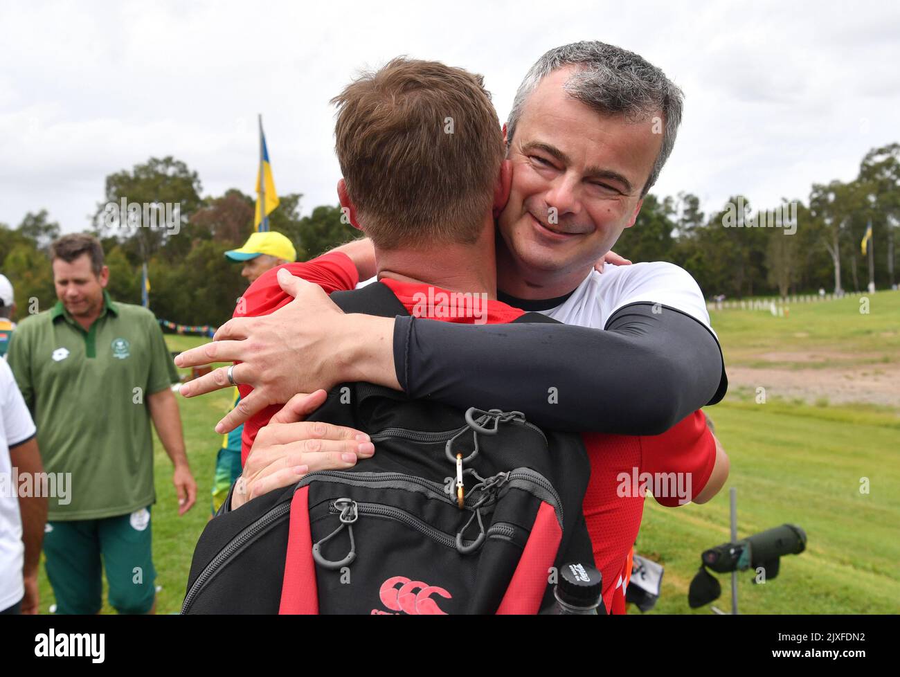 David Luckman (right) of England celebrates after winning the Gold ...