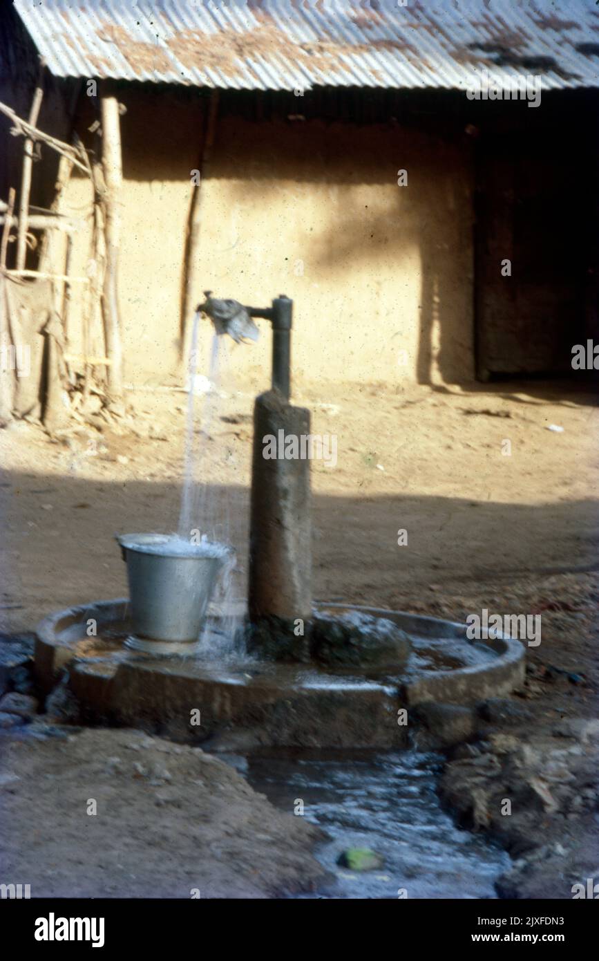 Water Flowing in Bucket, Common water source Stock Photo - Alamy
