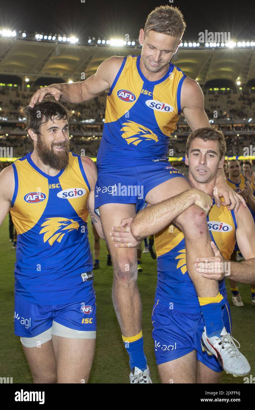 West Coast's 200 gamer Mark LeCras is chaired from the ground after the ...