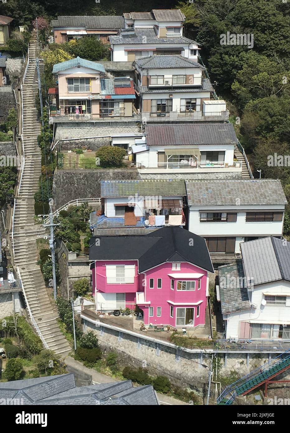 A cluster of contemporary homes on the side of the hill as seen from ...