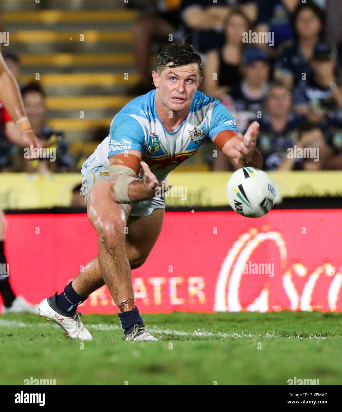 Mitch Rein of the Titans gets a pass away during the Round 7 NRL match ...