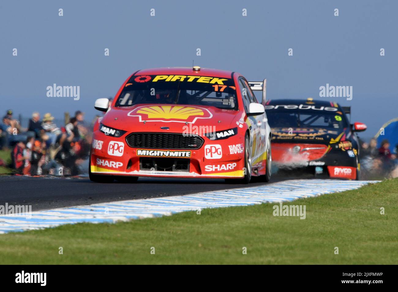 Scott McLaughlin of the Shell V-Power Racing Team leads David Reynolds ...