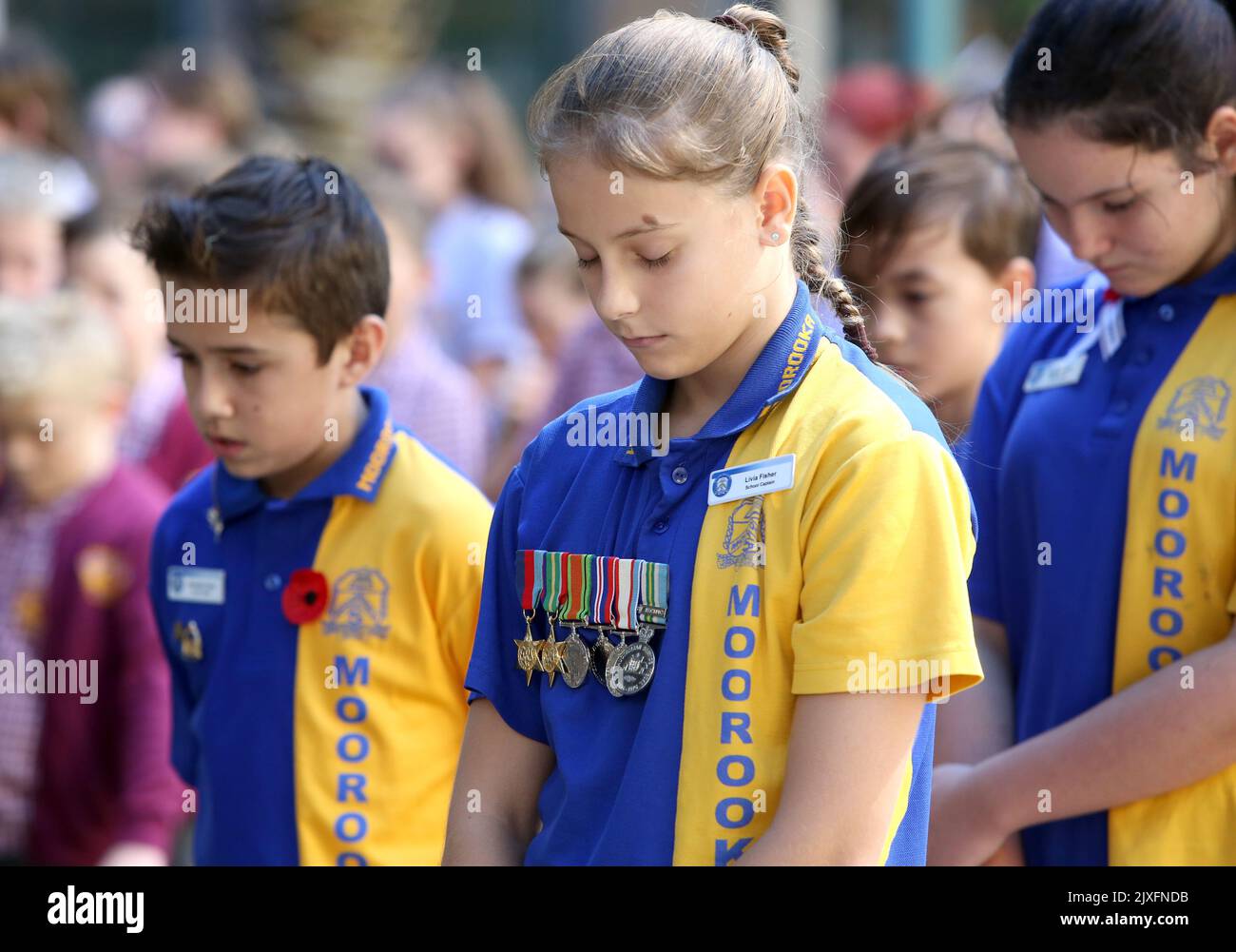 Students observe a moments silence during the Students' ANZAC ...