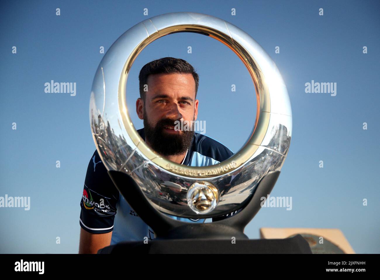 Alex Brosque of Sydney FC poses with the Hyundai A-League Championship ...