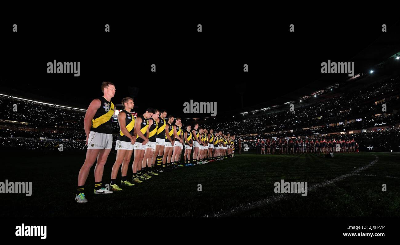 Players of the Tigers and of the Demons are seen during an ANZAC Day ...