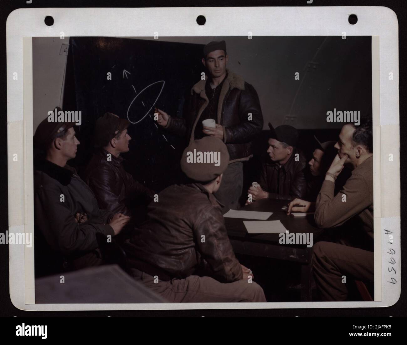 A Gunner Draws A Diagram Of Run Over Target, Aleutians Stock Photo - Alamy