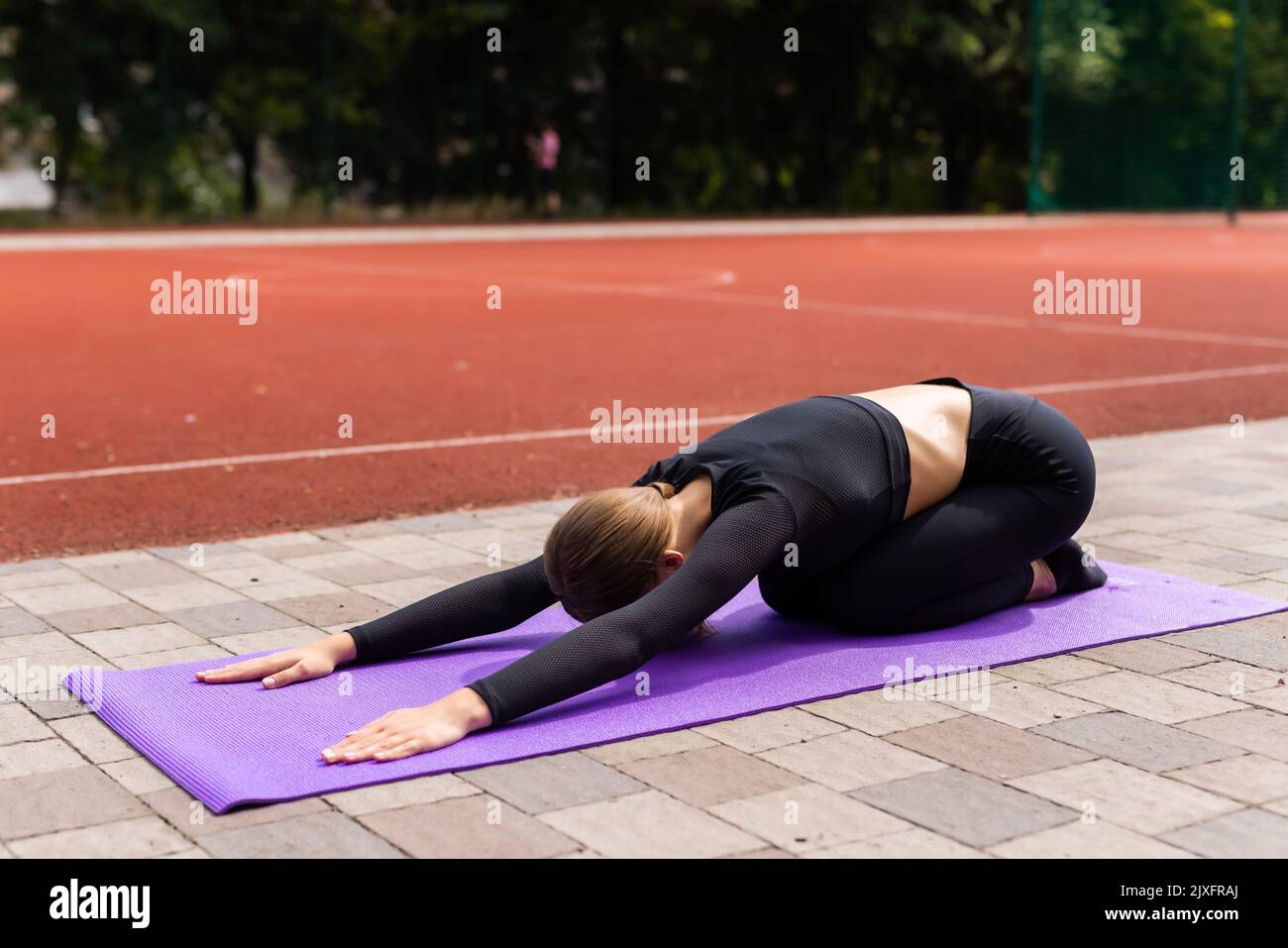 Fitness yoga woman stretching abdominal stomach muscles in cobra ...